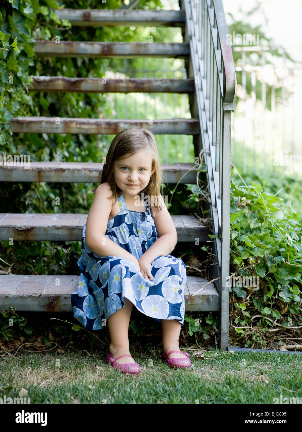 little girl in a blue dress Stock Photo - Alamy
