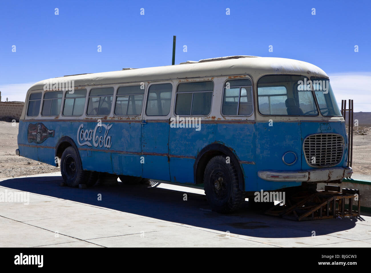 An old bus abandoned in the front oa petrol pump. Salar de Uyuni Desert ...