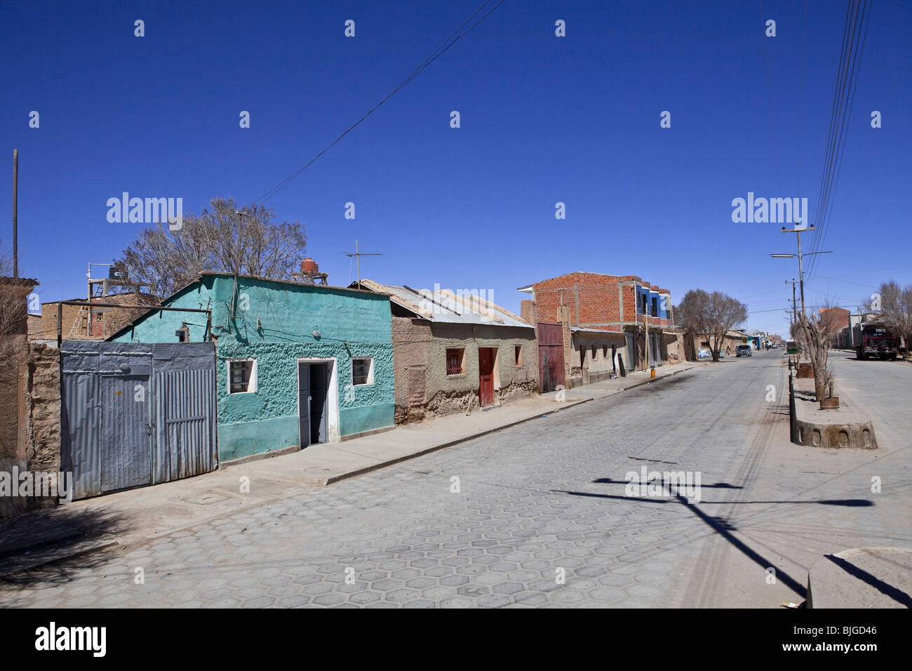 Panoramic view of an empty street in the village of Uyuni near the arid ...