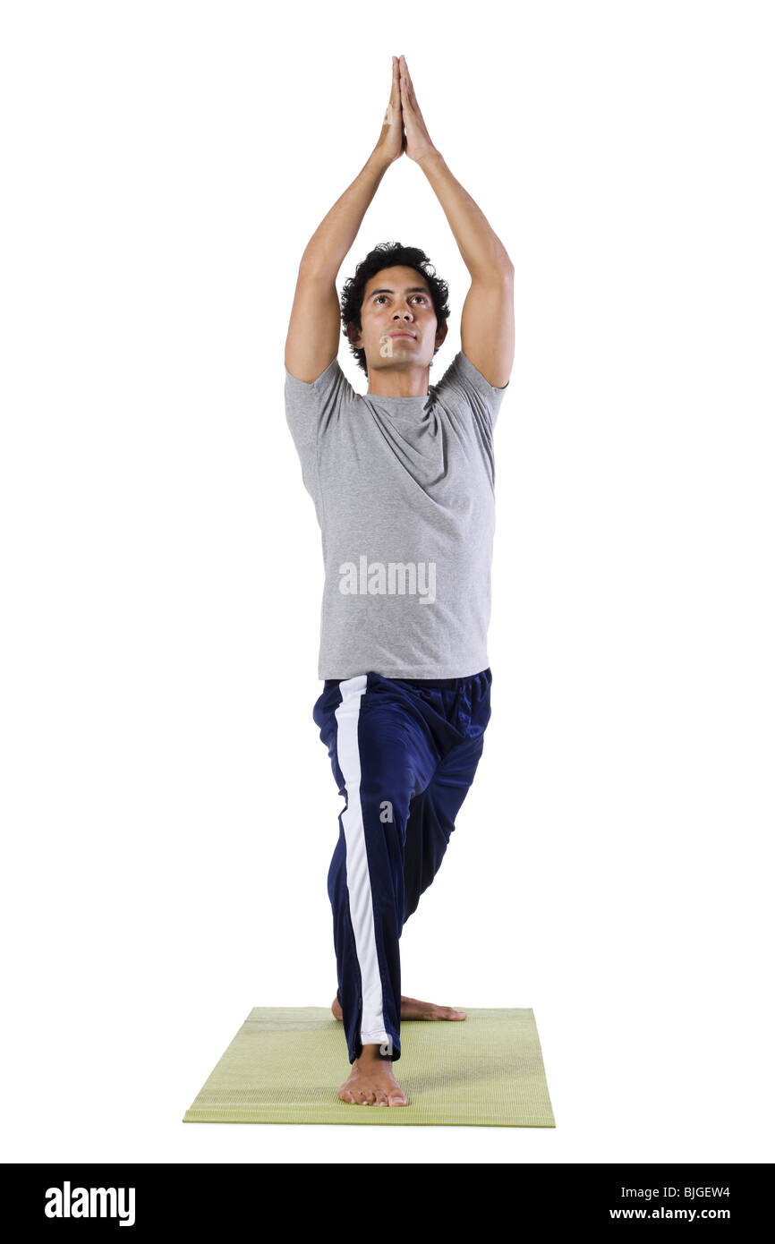 man doing yoga Stock Photo - Alamy