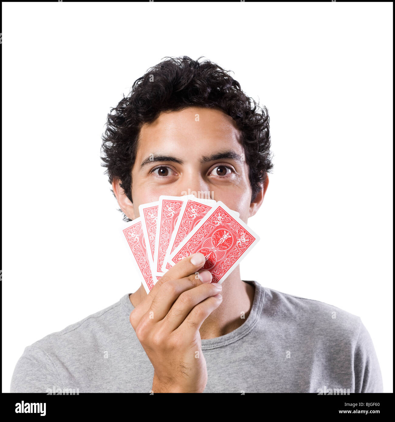 man covering his face with playing cards Stock Photo - Alamy