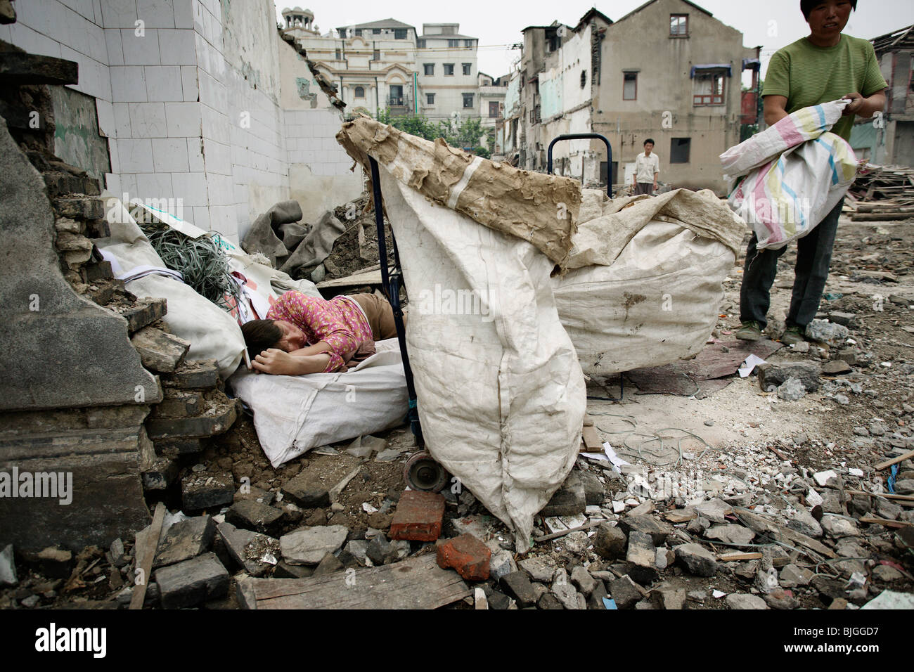 Construction workers resting in Shanghai's Puxi area, where new high ...