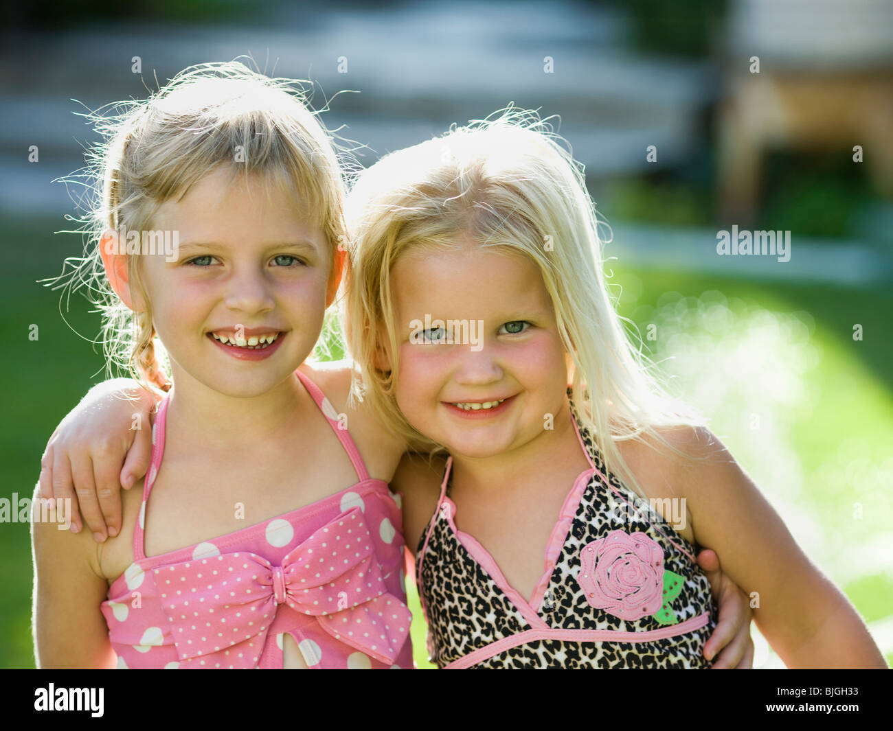 little girls in their swimsuits Stock Photo - Alamy