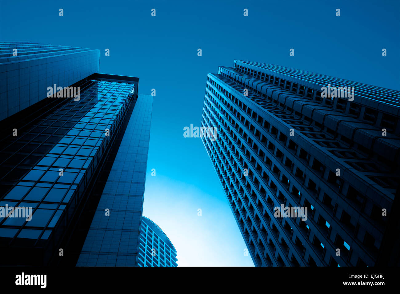Skyscrapers and grey sky Stock Photo - Alamy