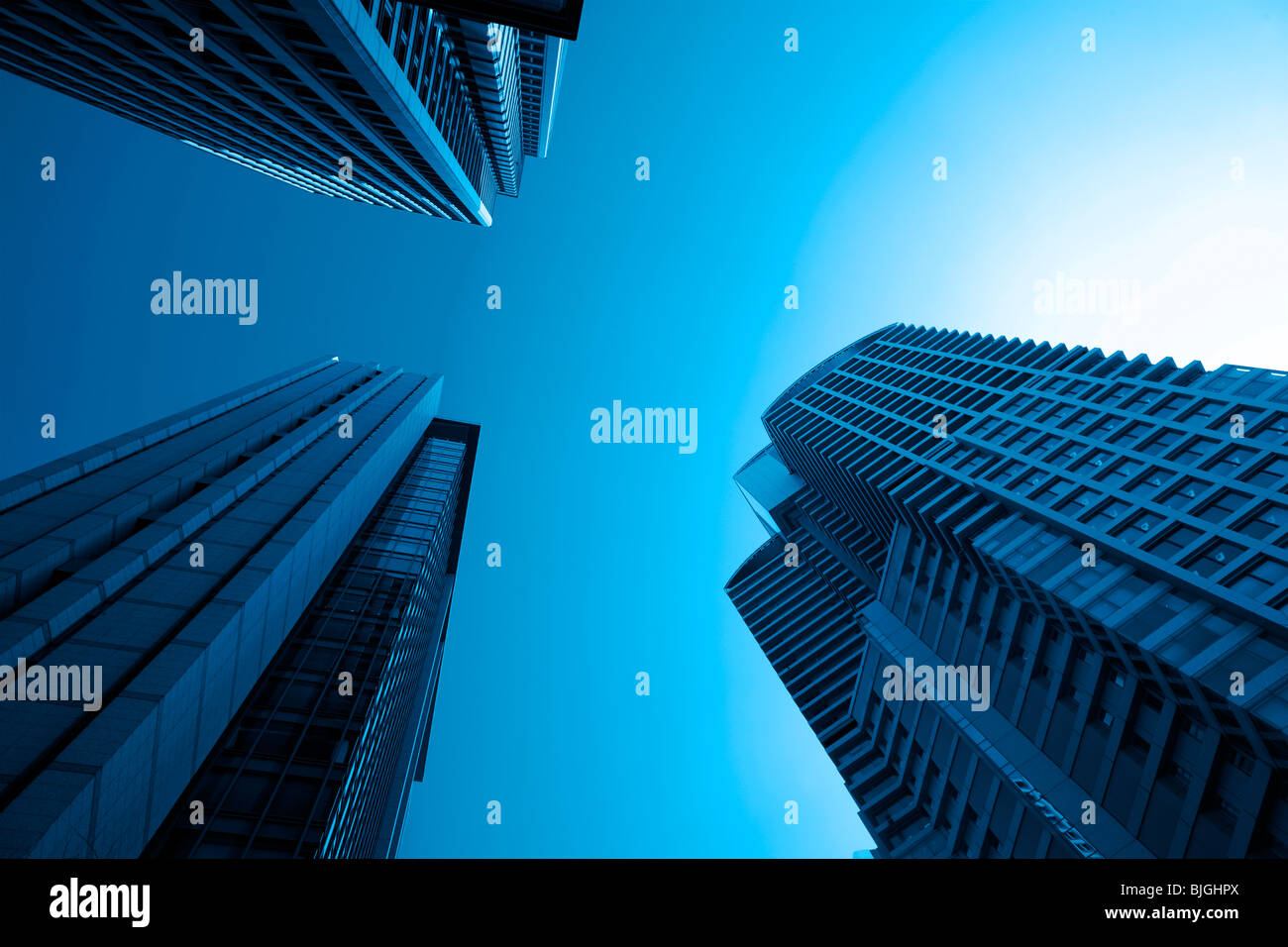 Skyscrapers and grey sky Stock Photo - Alamy