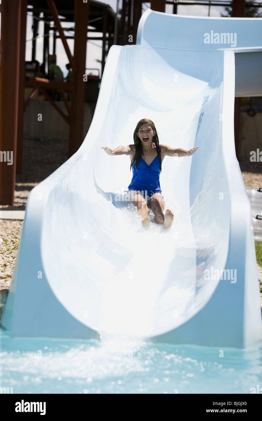 woman on a water slide Stock Photo - Alamy