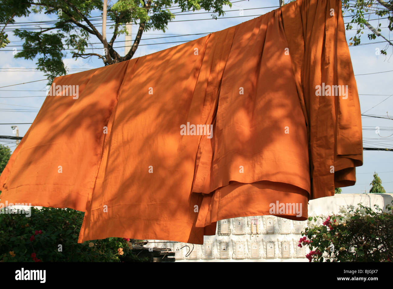 Monk washing clothes hi-res stock photography and images - Alamy