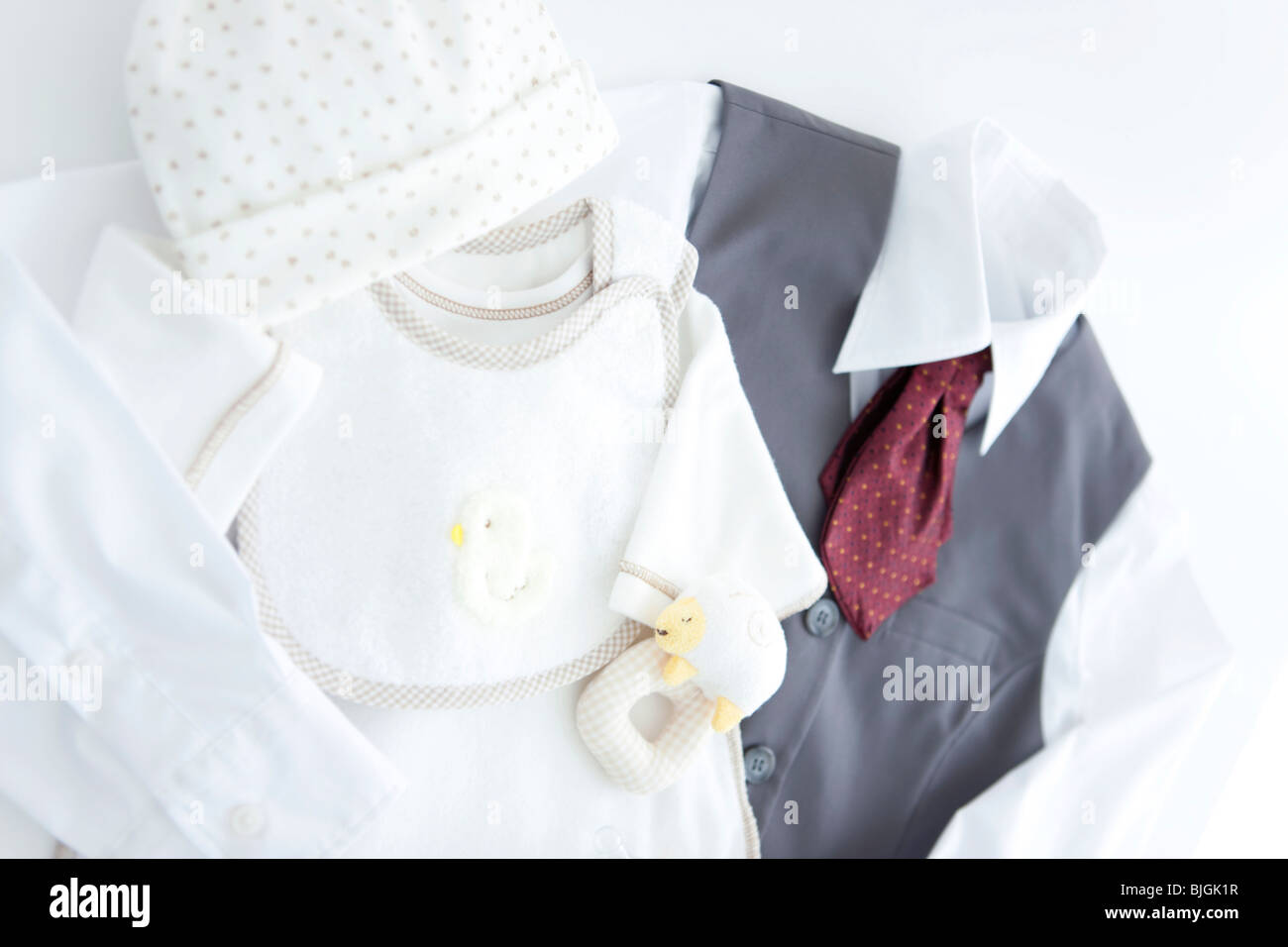 Uniform and baby clothes Stock Photo - Alamy