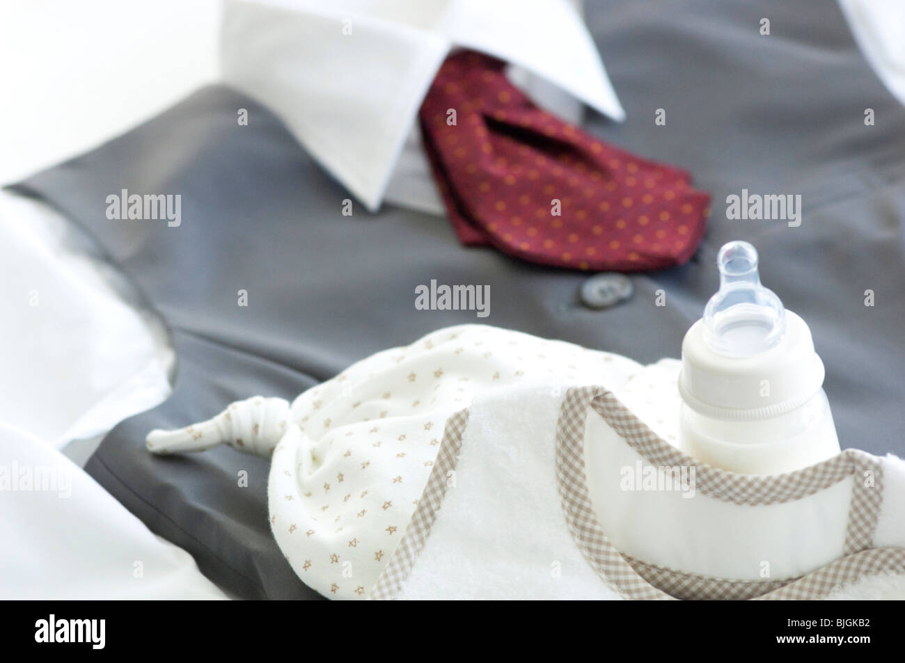 Uniform and baby clothes Stock Photo - Alamy