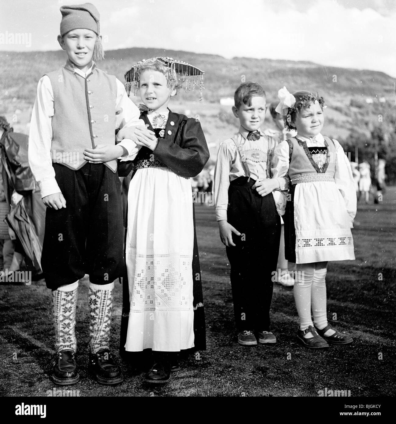 1950s, Voss, Norway. Children pose in traditional Norweigian costumes ...
