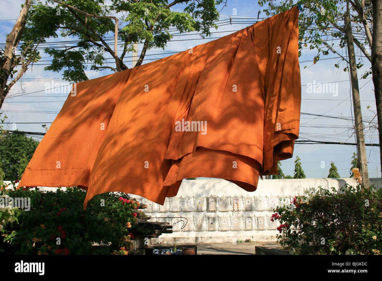 Buddhist monk clothes drying in the sun, Thailand Stock Photo - Alamy