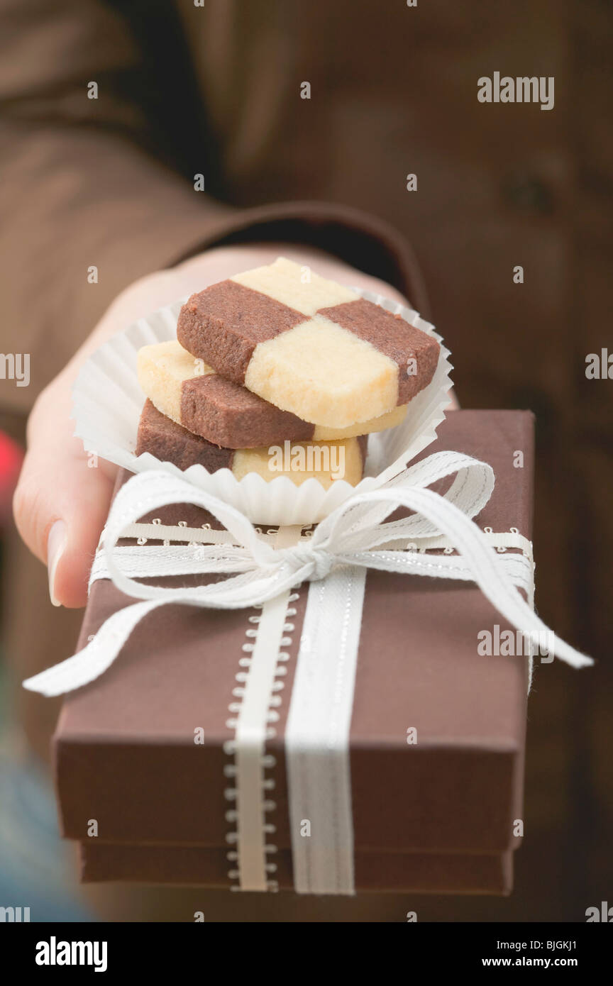 Woman alone eating cookies hi-res stock photography and images - Alamy
