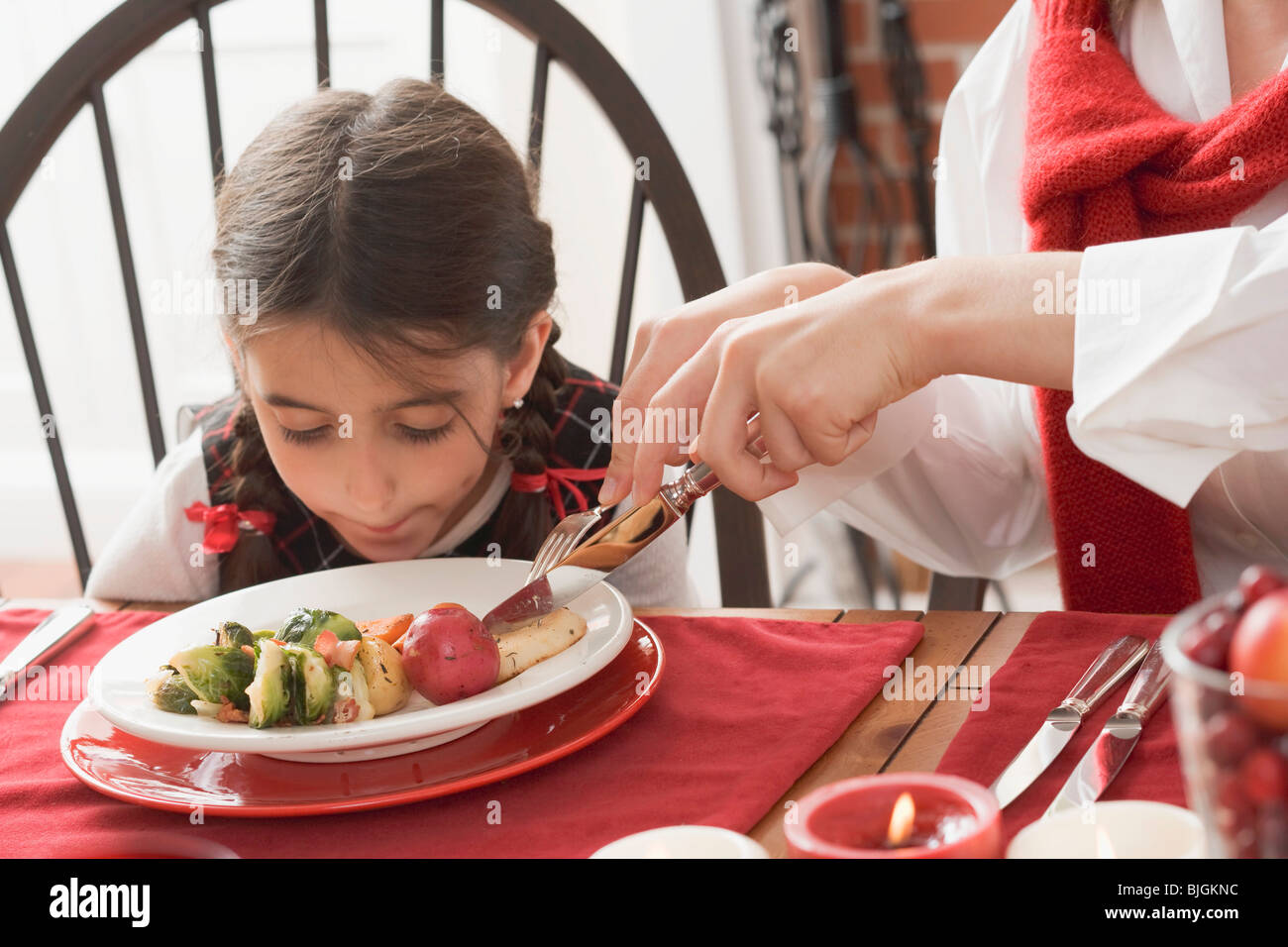 Woman and child eating Christmas dinner (USA Stock Photo - Alamy