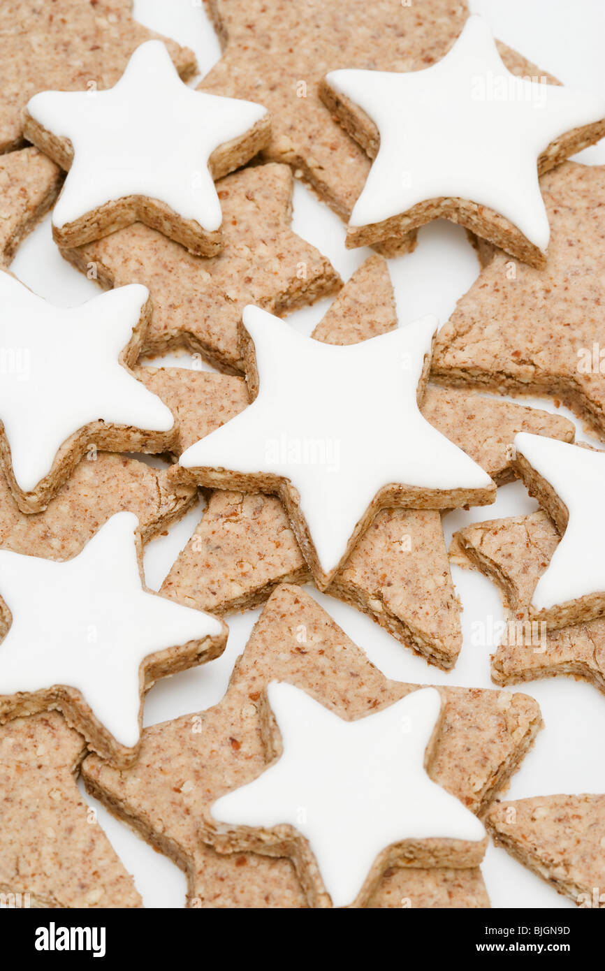 Cinnamon stars with and without icing Stock Photo - Alamy