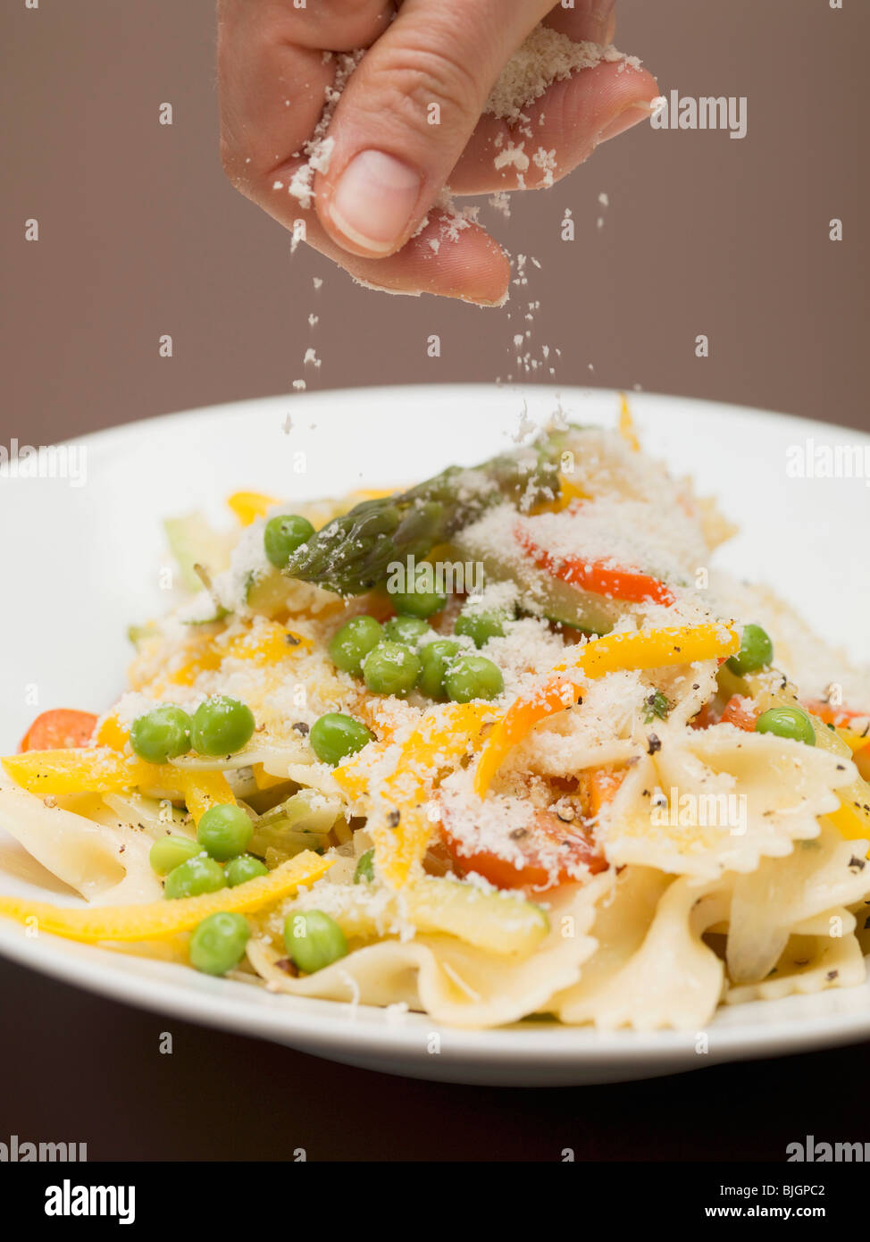 Sprinkling Cheese High Resolution Stock Photography and Images - Alamy
