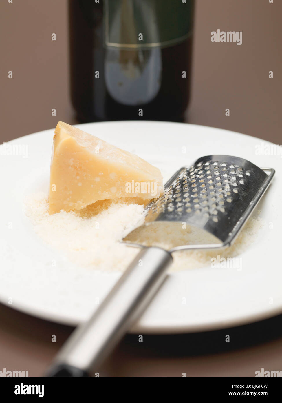 Parmesan with grater hi-res stock photography and images - Alamy