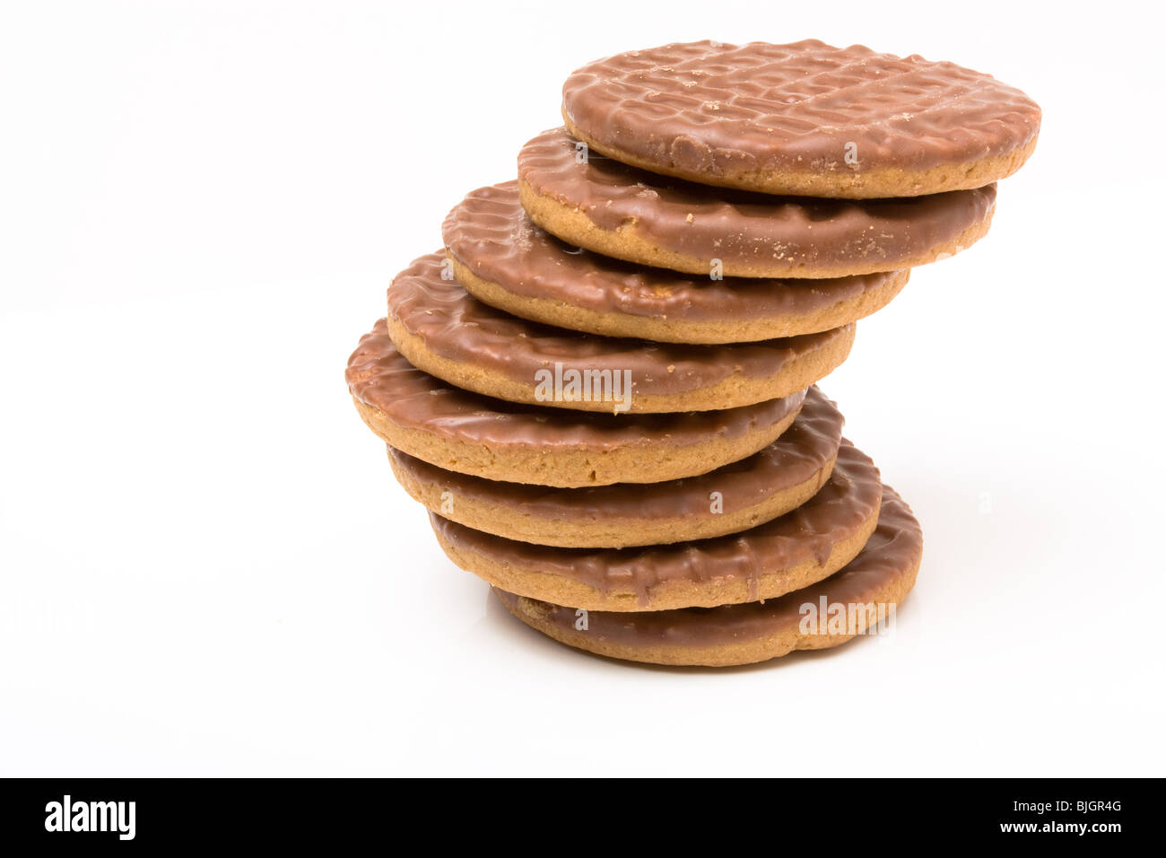 Stack of Chocolate Digestive biscuits isolated against white background ...