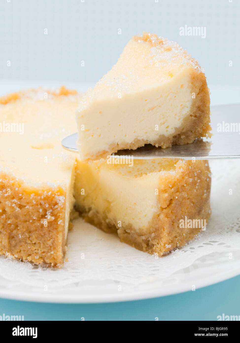Small cheesecake, one piece on server Stock Photo - Alamy