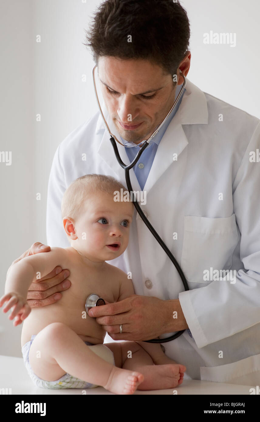 Doctor and baby Stock Photo - Alamy