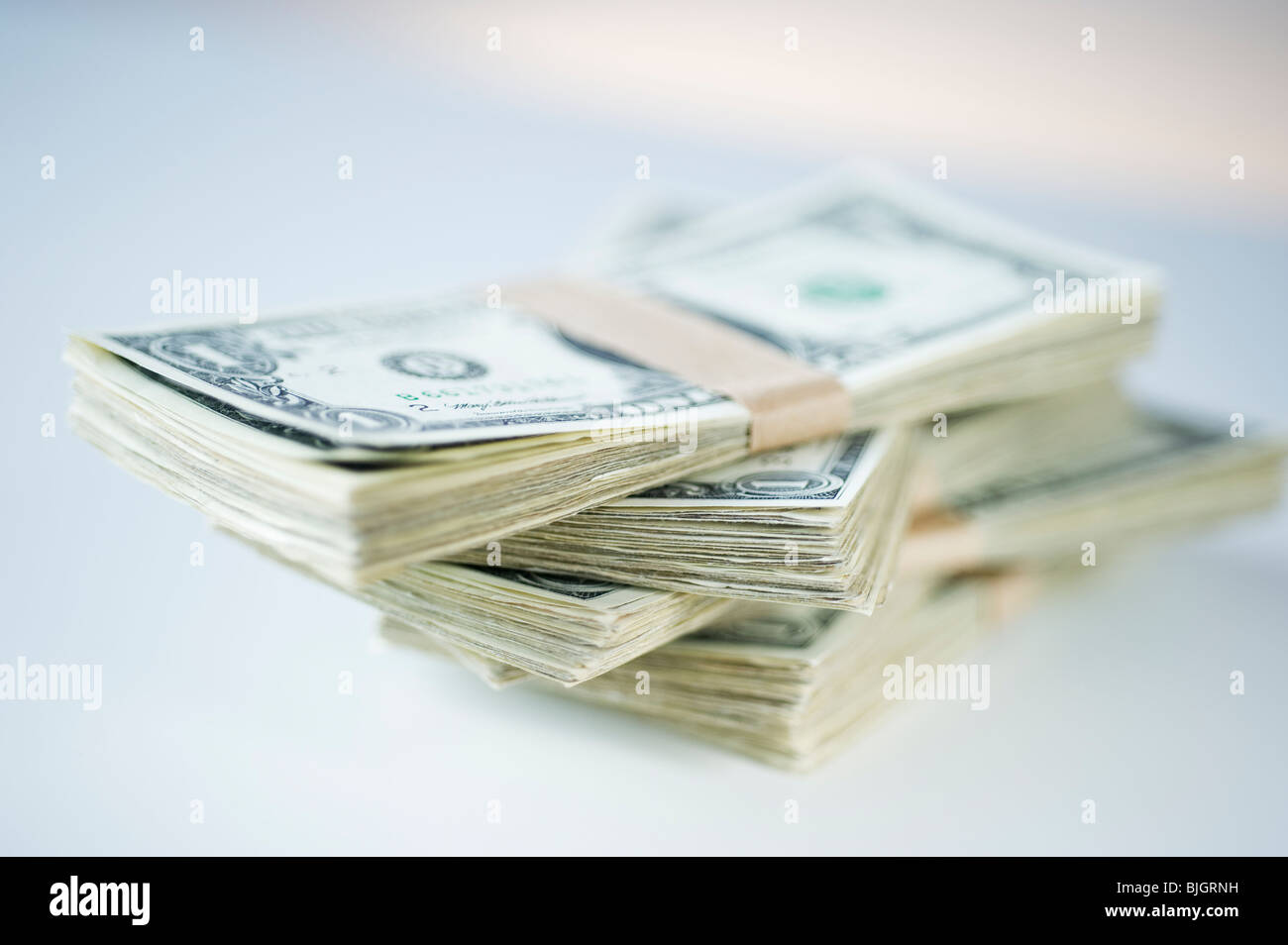 Stacks of money Stock Photo - Alamy
