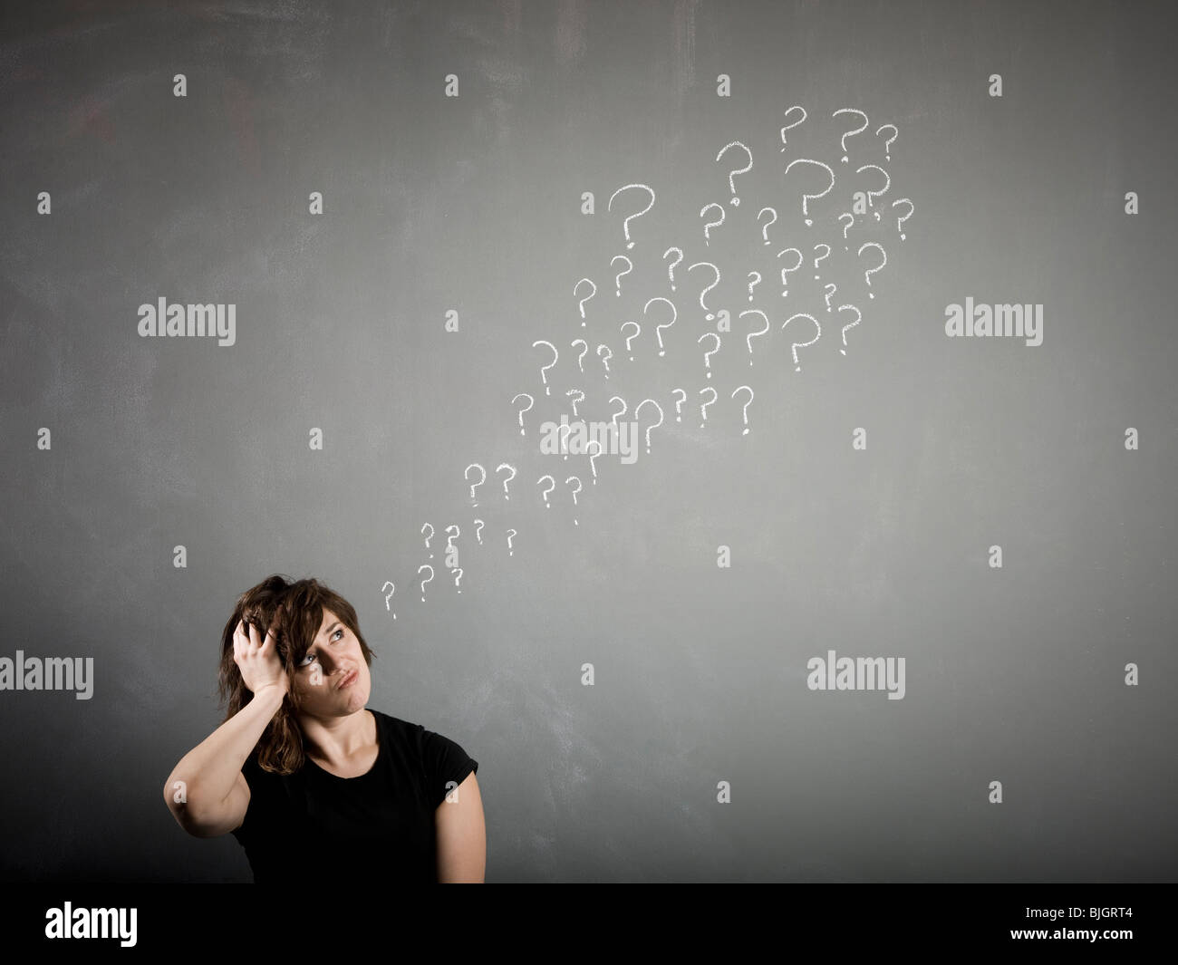 Woman question marks head hi-res stock photography and images - Alamy