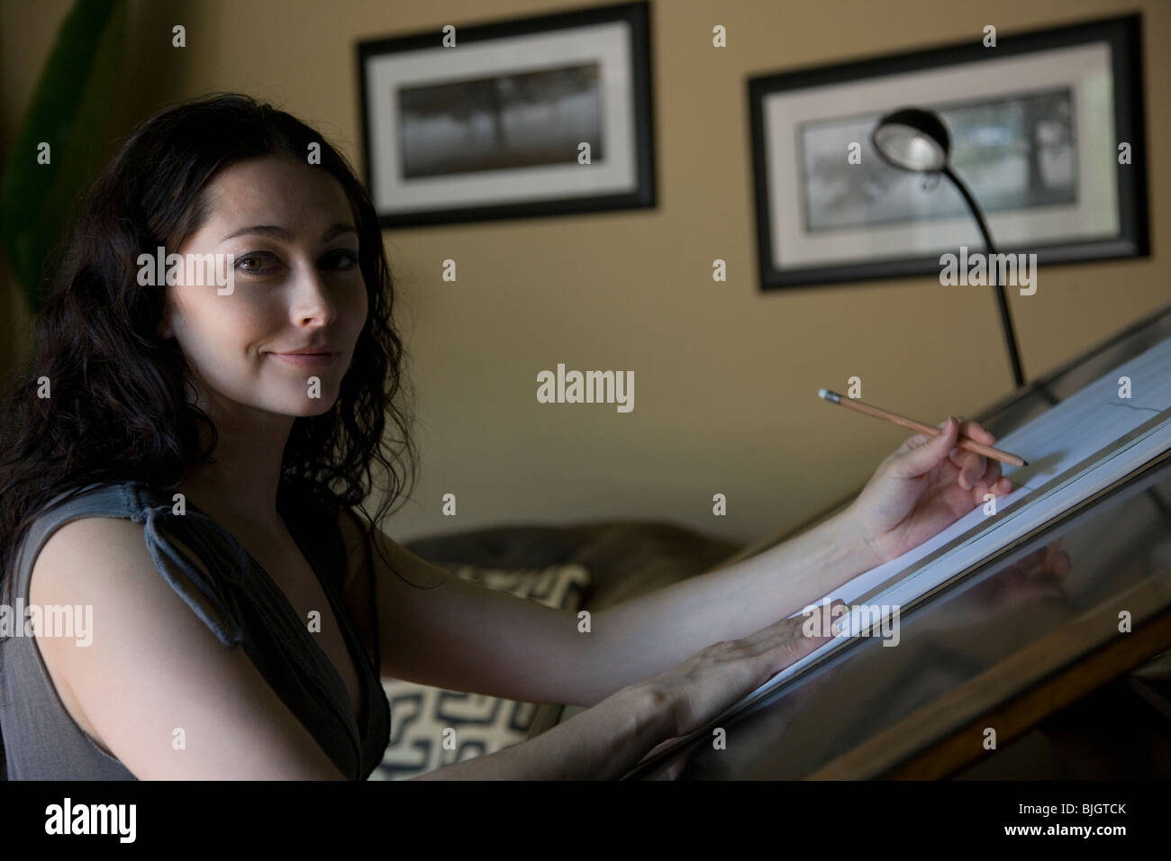 woman at a drafting table Stock Photo - Alamy