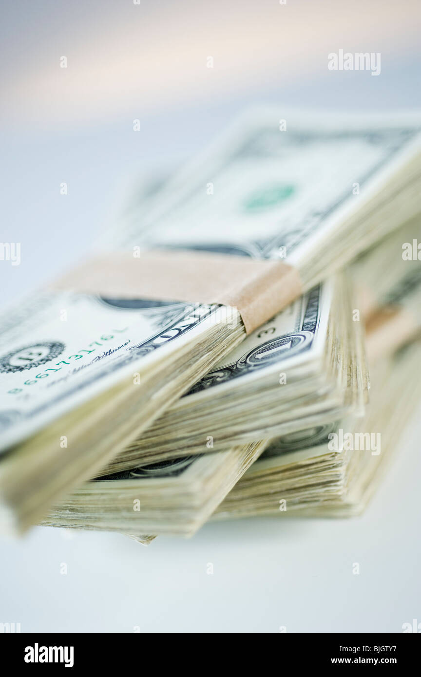 Stacks of money Stock Photo - Alamy