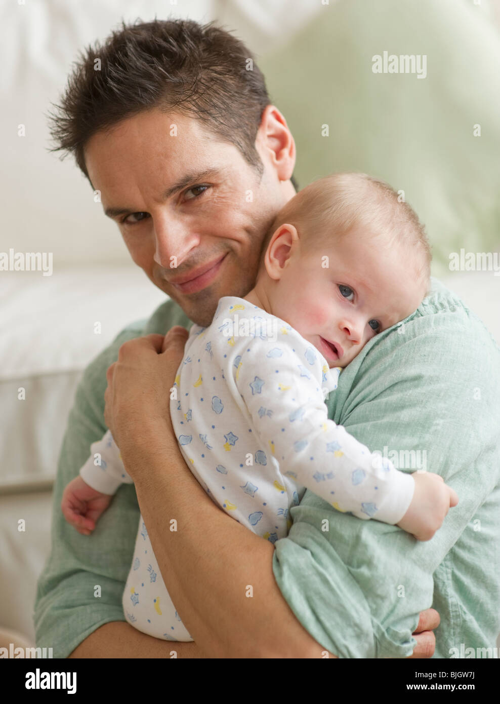 Father hugging baby Stock Photo - Alamy