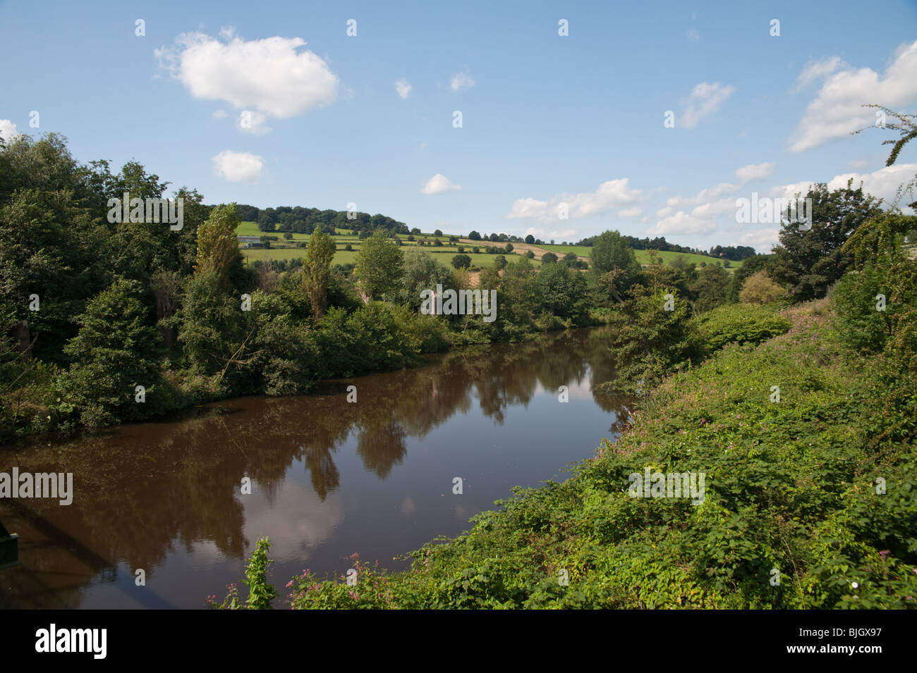 River Derwent just above Belper, Derbyshire, England runs through green ...