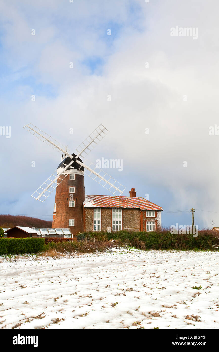 Weybourne windmill in Norfolk following winter snow showers Stock Photo ...