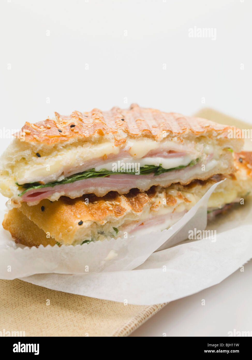 Toasted flatbread with cheese and ham filling Stock Photo - Alamy