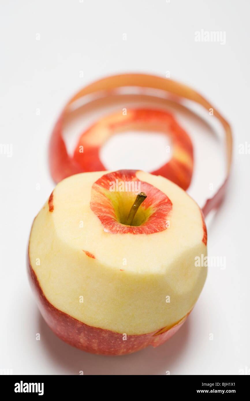 Gala apple, partly peeled Stock Photo - Alamy
