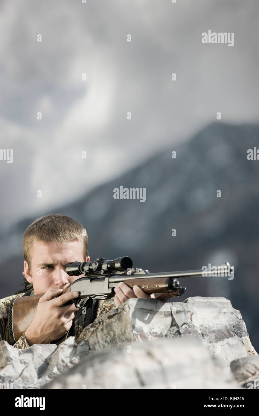 man hunting in the wilderness Stock Photo - Alamy