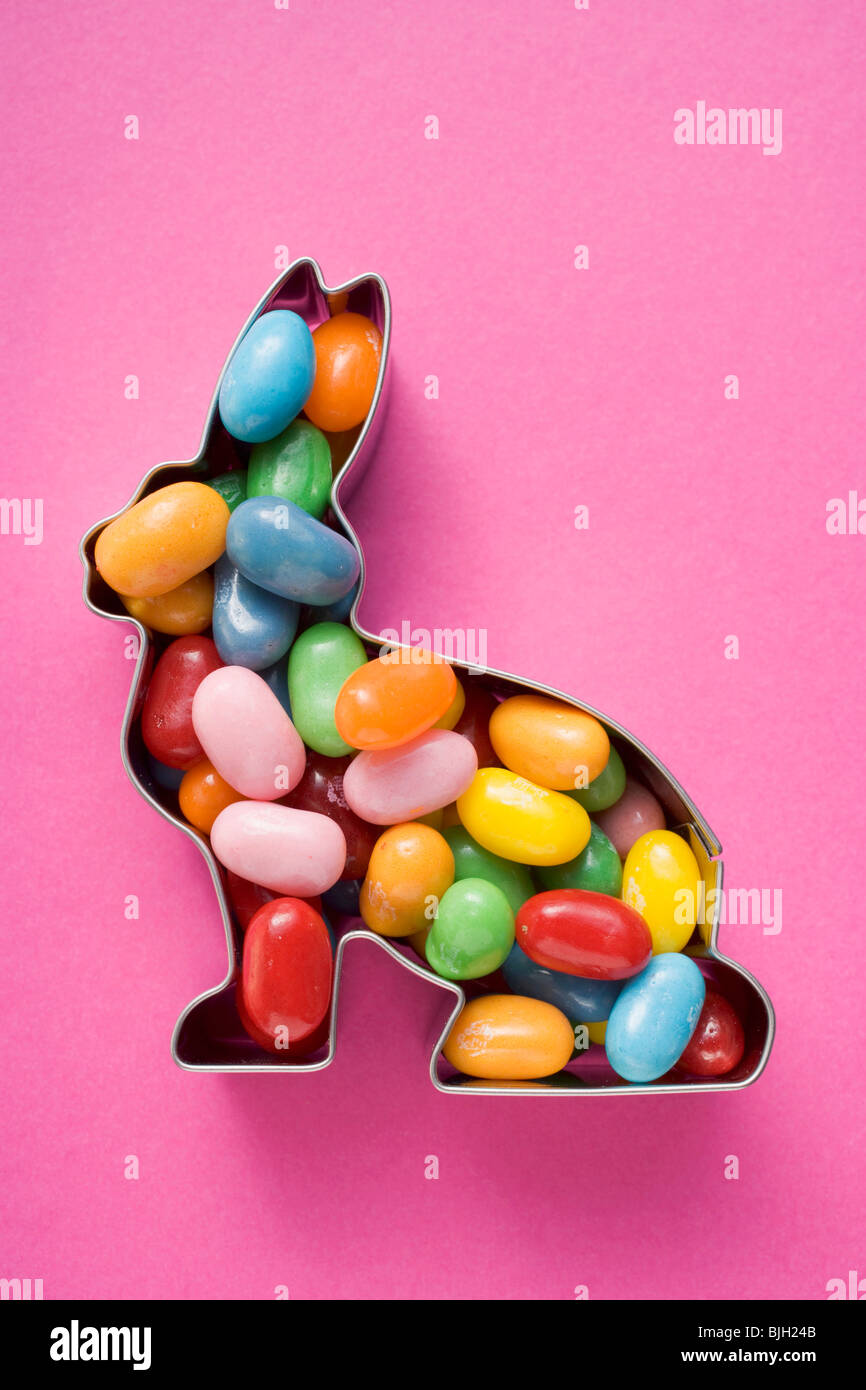 Easter Bunny cutter filled with jelly beans Stock Photo - Alamy