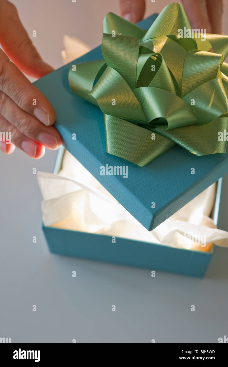 Present opening and tissue hi-res stock photography and images - Alamy