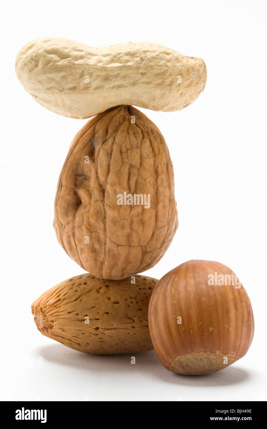 Assorted nuts, some stacked Stock Photo - Alamy