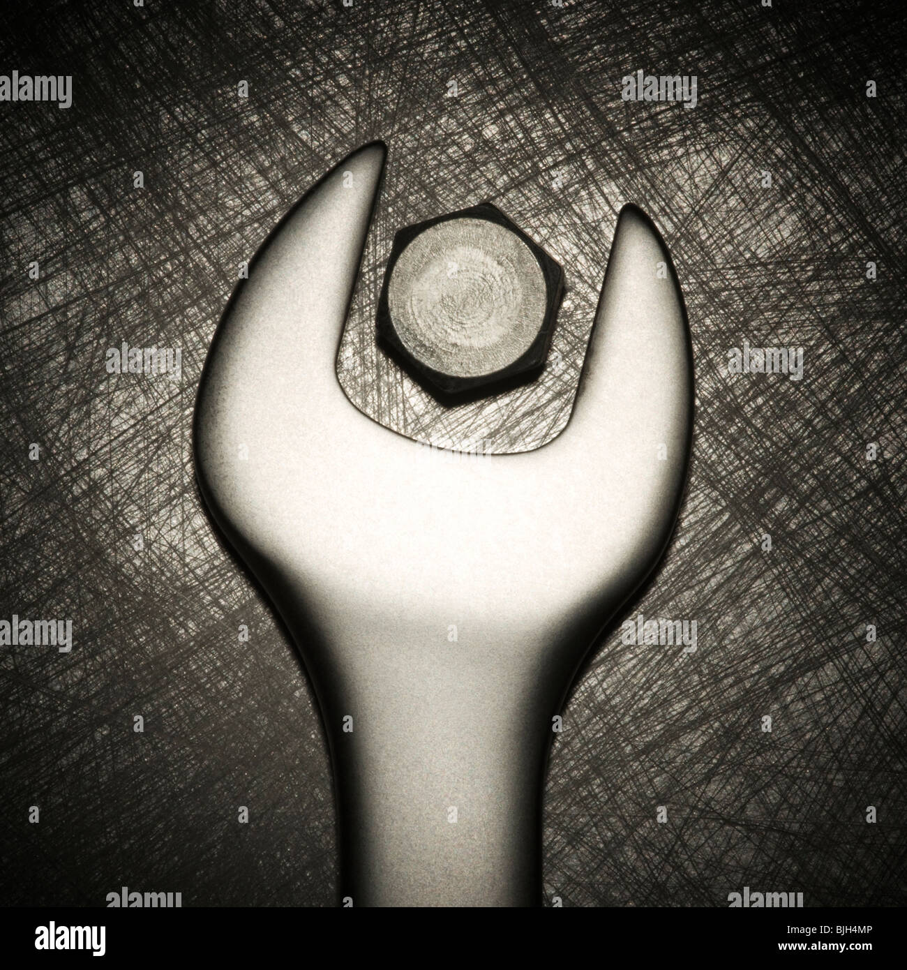wrong size wrench trying to turn a bolt Stock Photo - Alamy