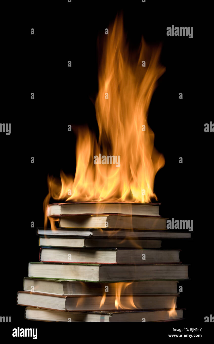 stack of books on fire Stock Photo - Alamy