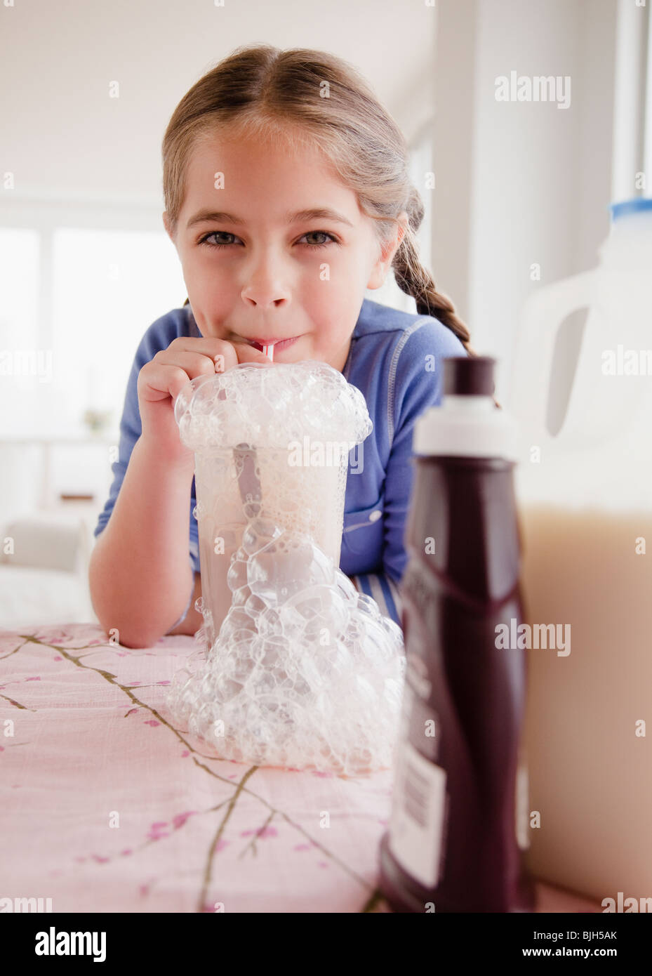 Blowing milk bubbles hi-res stock photography and images - Alamy