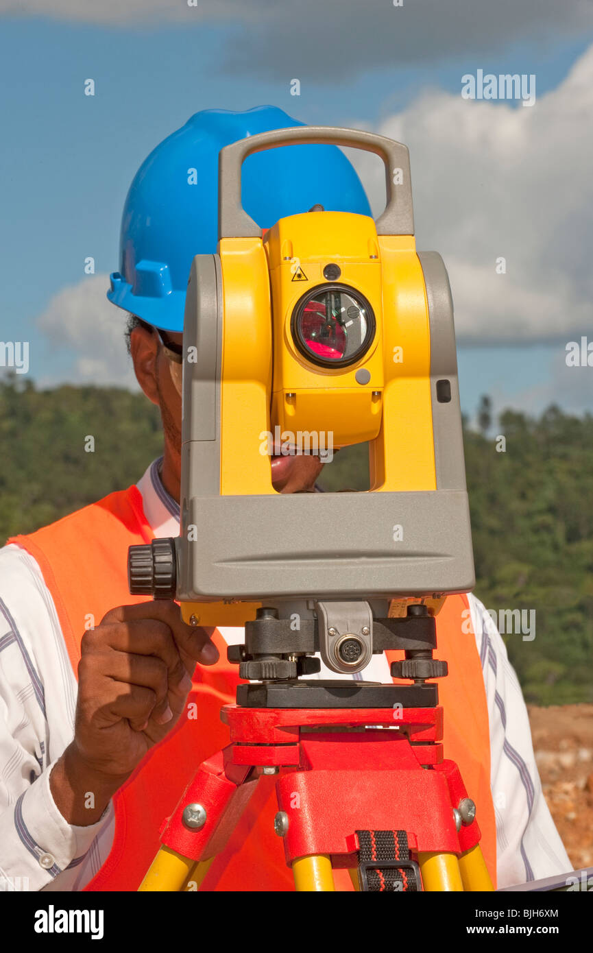 Surveyor on construction site in South America Stock Photo - Alamy