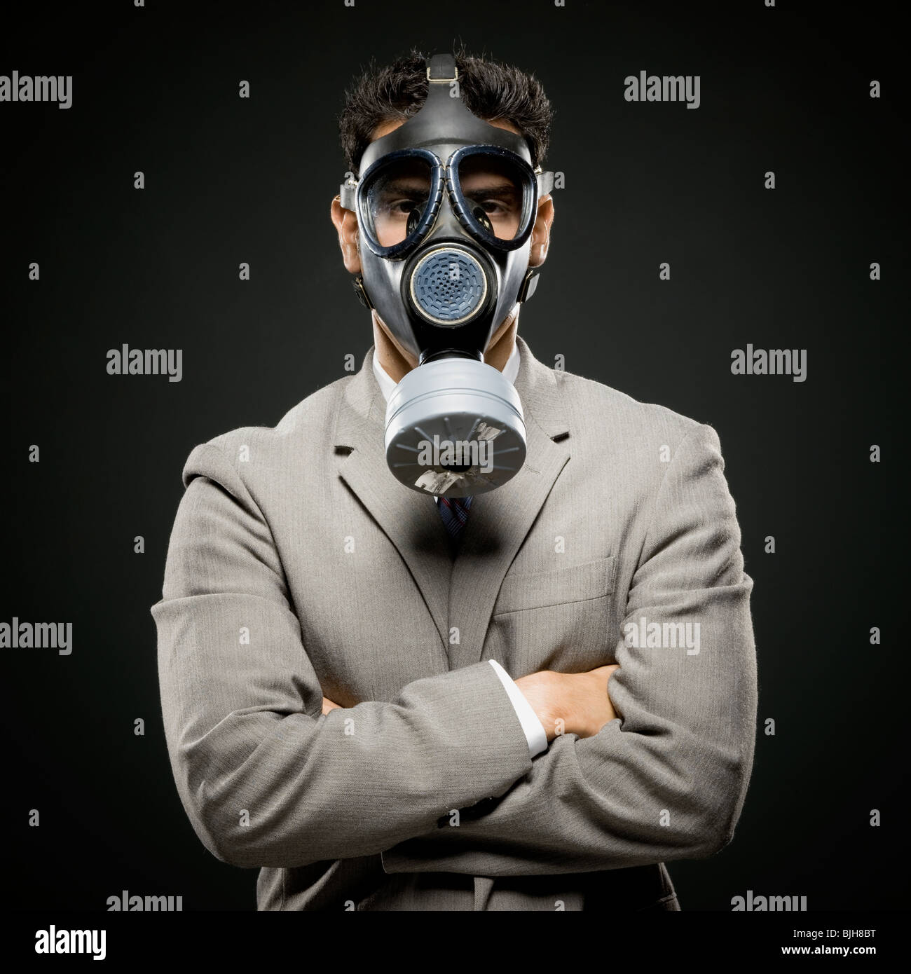 businessman wearing a gas mask Stock Photo - Alamy