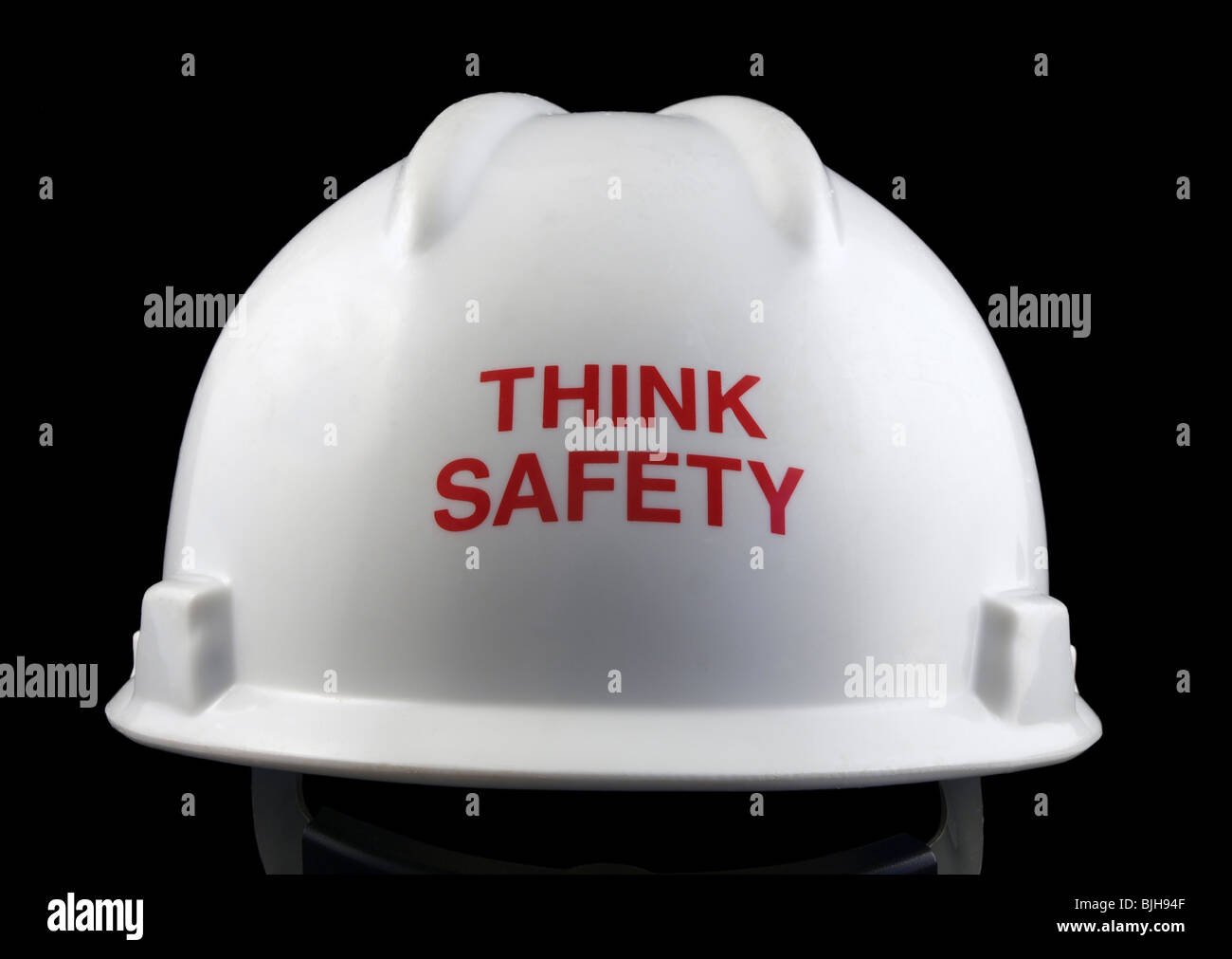 Think safety message on the back of a hard hat Stock Photo - Alamy