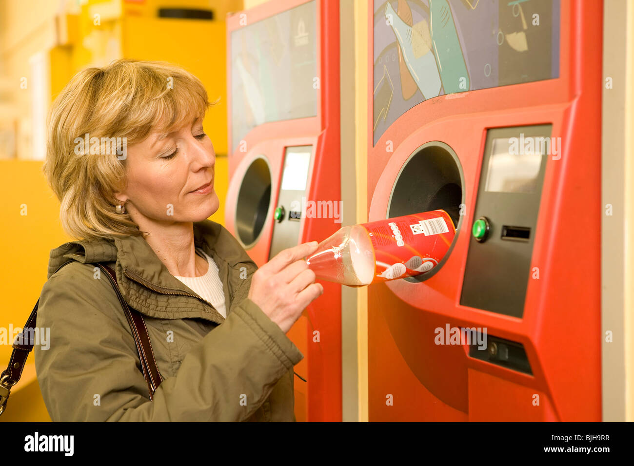 Woman returning deposit bottles Stock Photo - Alamy