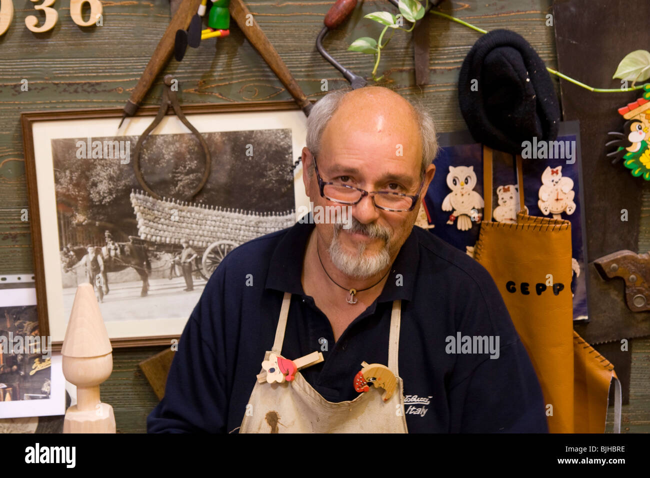 Italy, Rome, An Italian carpenter toy maker carving wooden dolls Stock ...