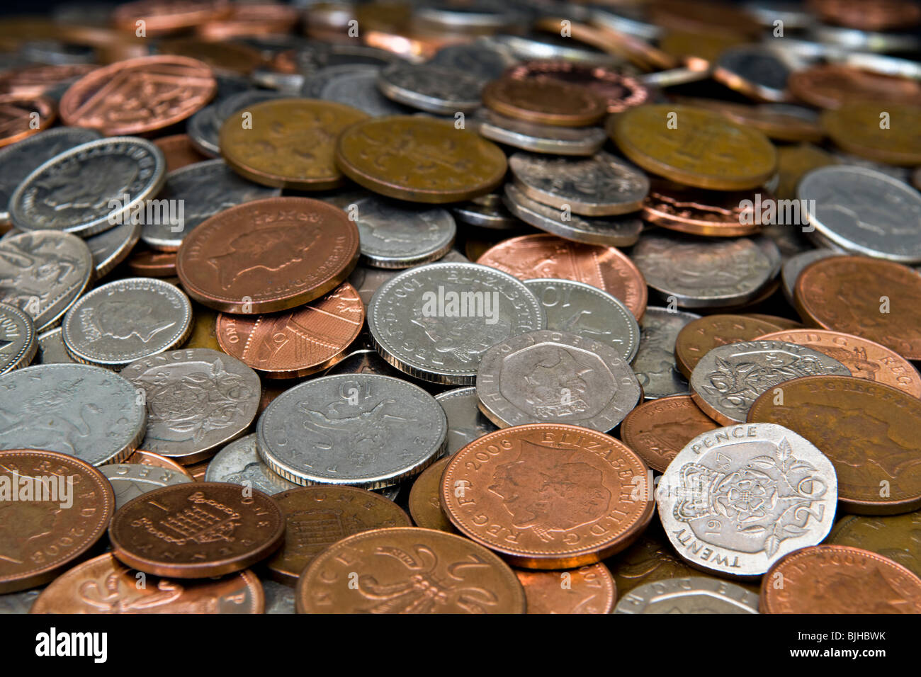 Table full of loose change in sterling Stock Photo - Alamy