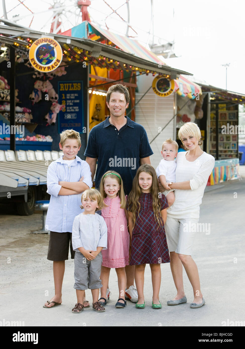 family at the carnival Stock Photo - Alamy