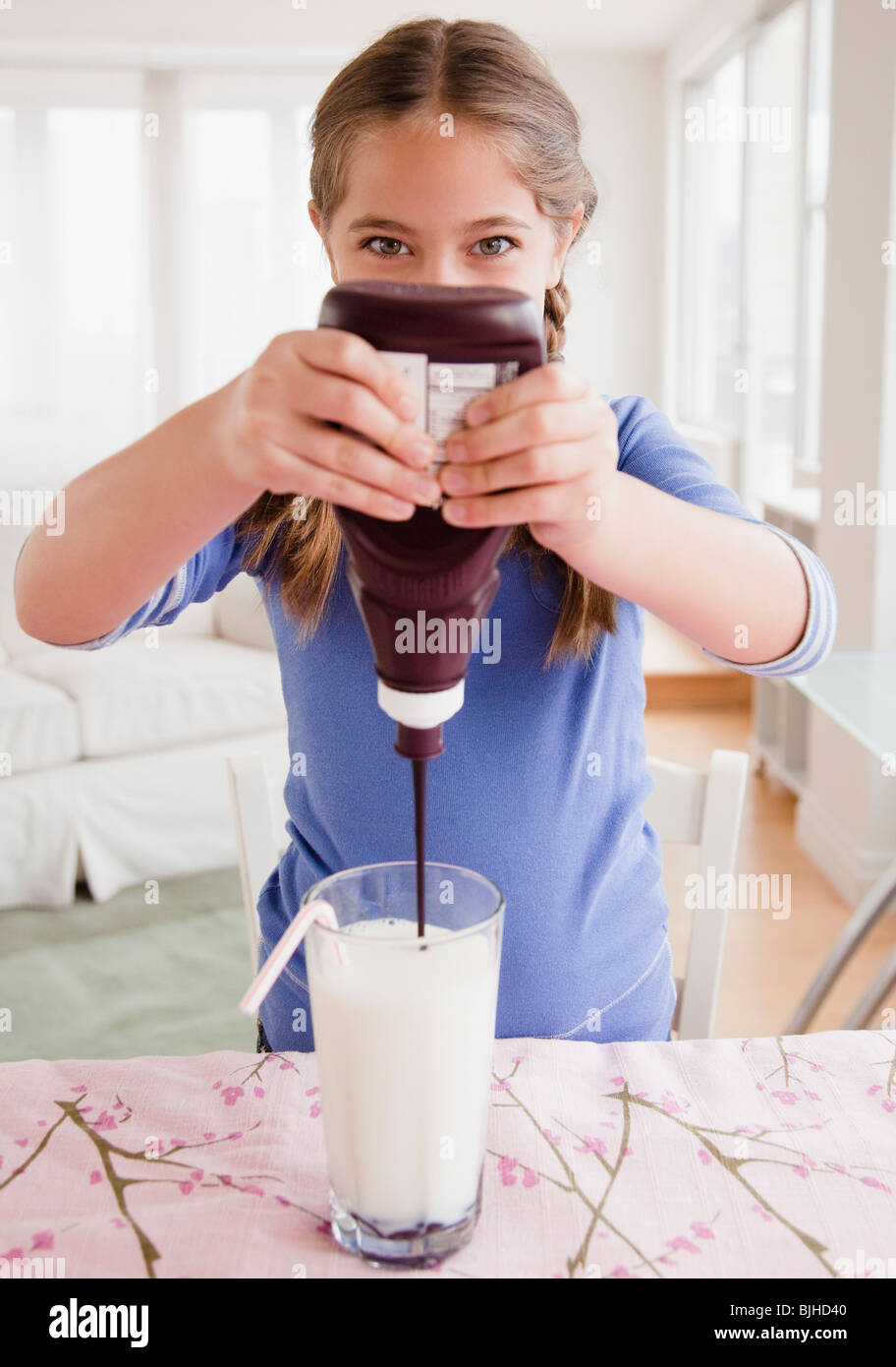 Squeezing milk into hi-res stock photography and images - Alamy