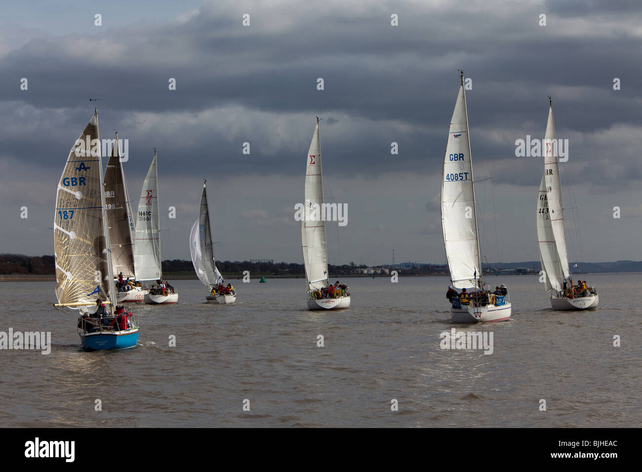 Yacht race start seven boats Stock Photo - Alamy