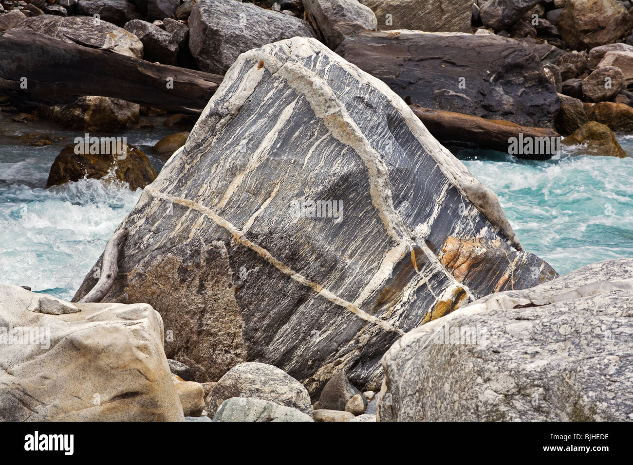 A GRANITE ROCK on the DUDH RIVER on the AROUND MANASLU TREK - NUPRI ...
