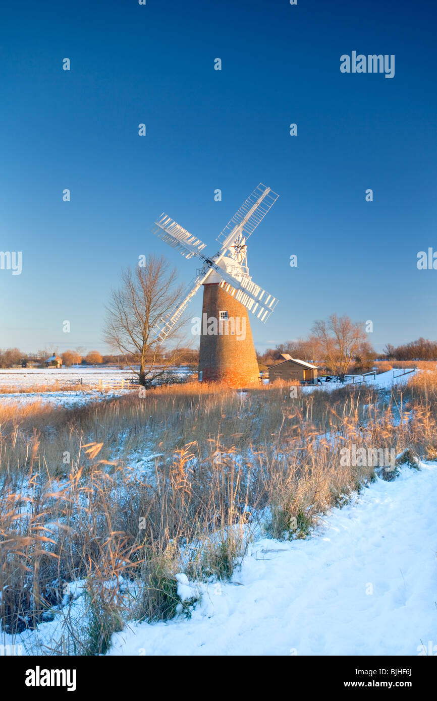 The Leaning Hardley Drainage Mill at first light following winter ...